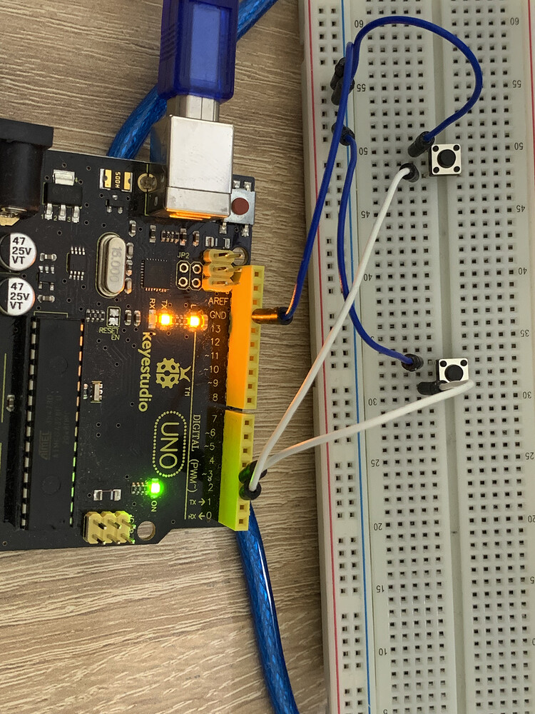 System with two buttons - General Guidance - Arduino Forum