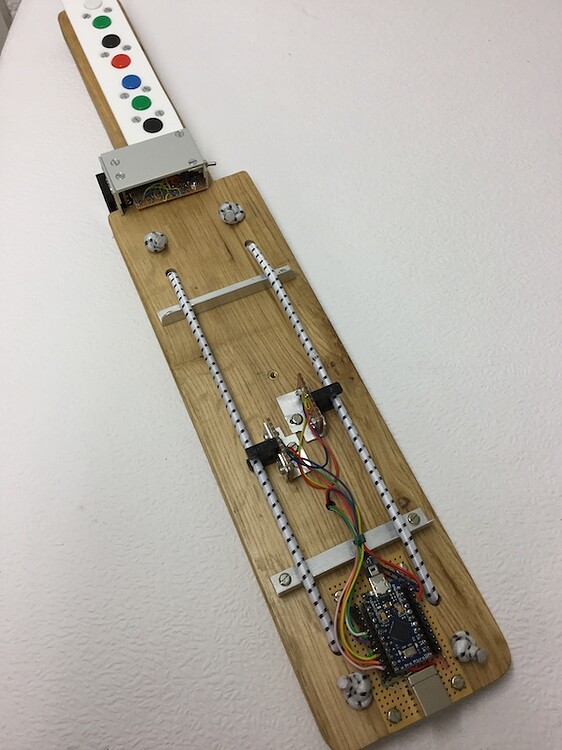 Sensing string vibration/activation in an accessible guitar - General ...