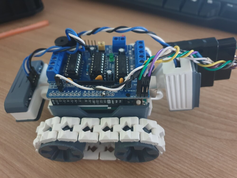 Use of Passive Buzzer blocks all the functions of my Robot Car - Programming - Arduino Forum
