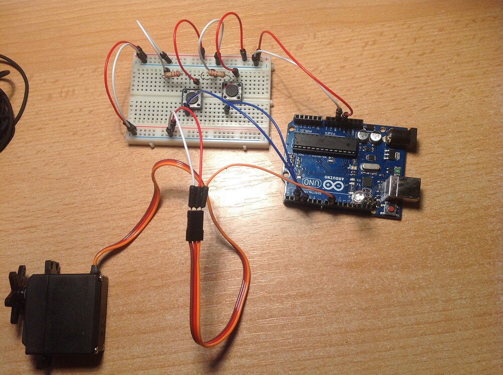 Controling servos with buttons - Programming - Arduino Forum
