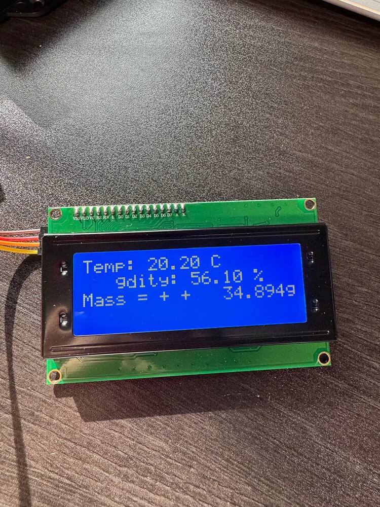 Reading an electronic balance using RS232 and a MAX3232 and displaying the mass on an LCD, along ...