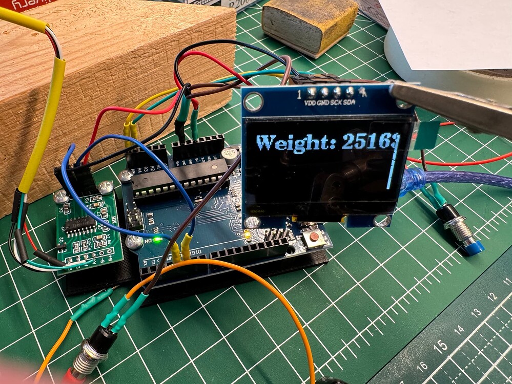 Getting weight from load cell on to oled - Programming - Arduino Forum