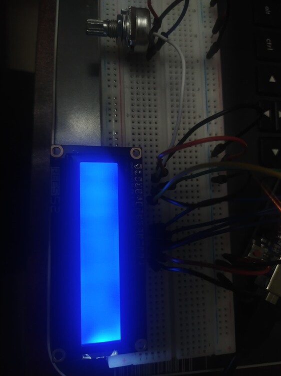 My LCD (16x2) lights up but doesn't print anything! not even black ...