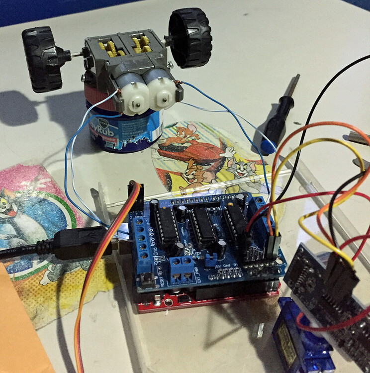 Motor Shield moving backwards when forward and vv - Programming ...