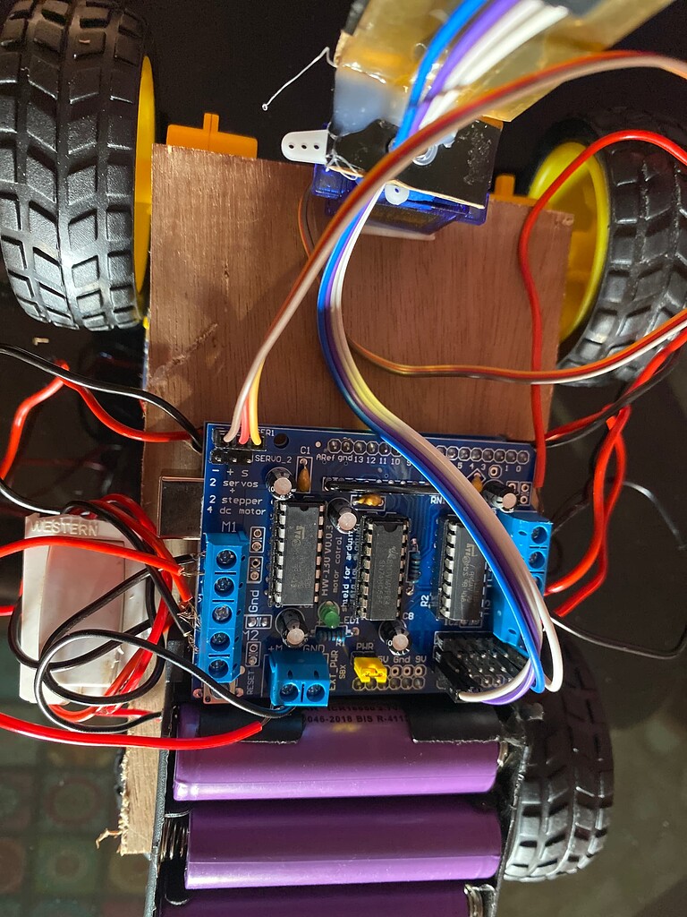 Arduino uno obstacle avoiding car not working - General Guidance - Arduino Forum