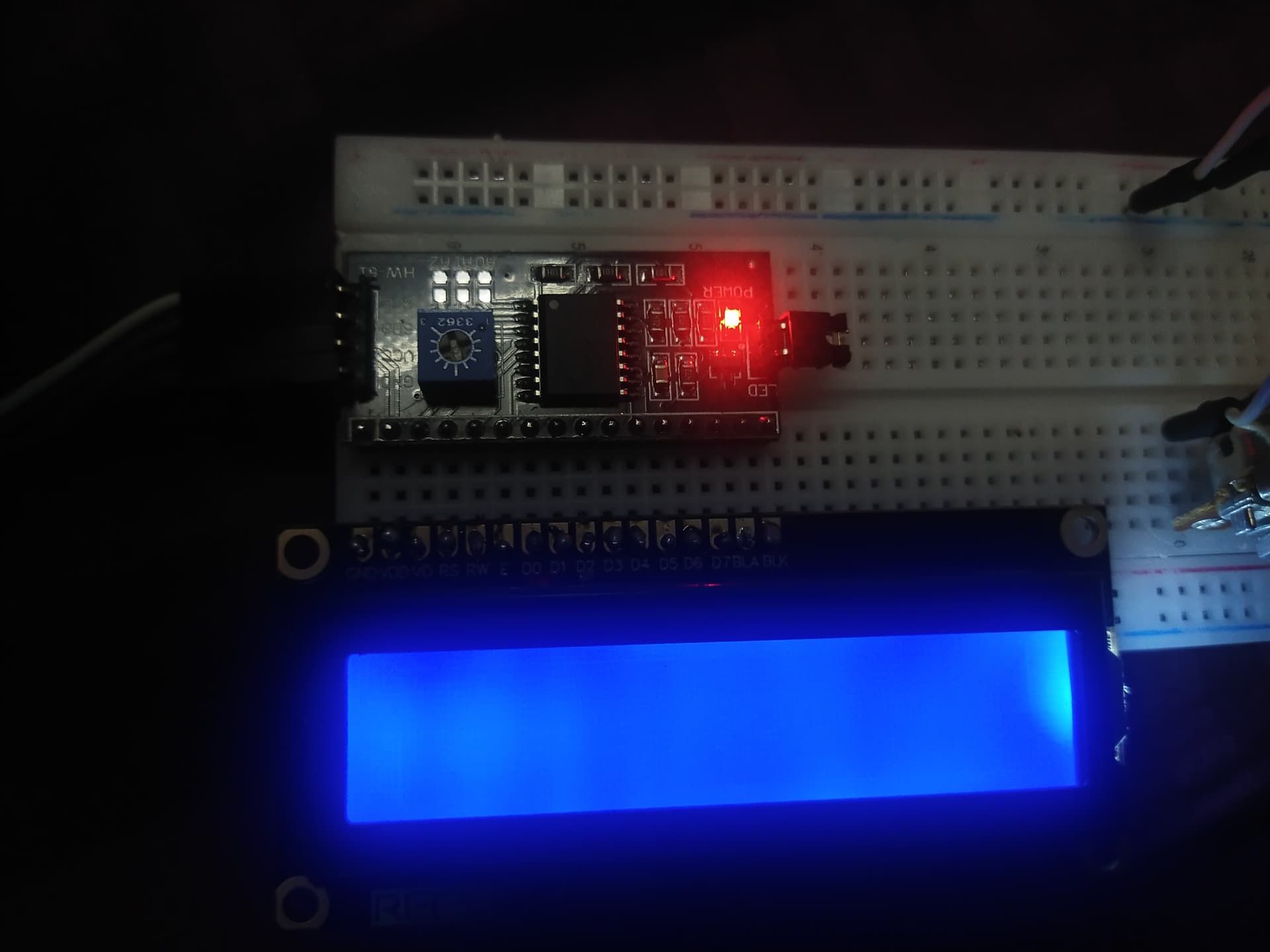 My LCD (16x2) lights up but doesn't print anything! not even black ...