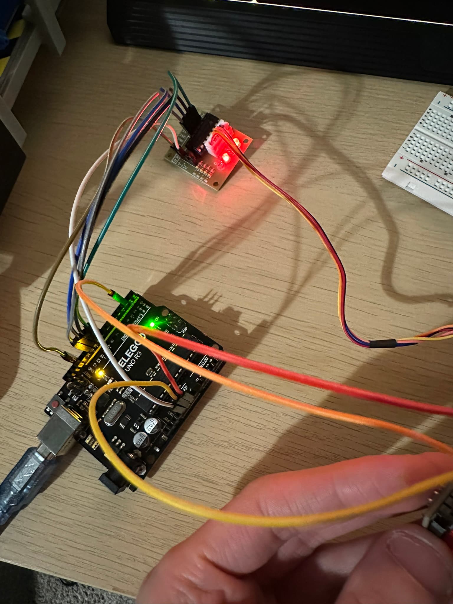 How would I build a circuit to control a stepper motor with this button - General Guidance ...