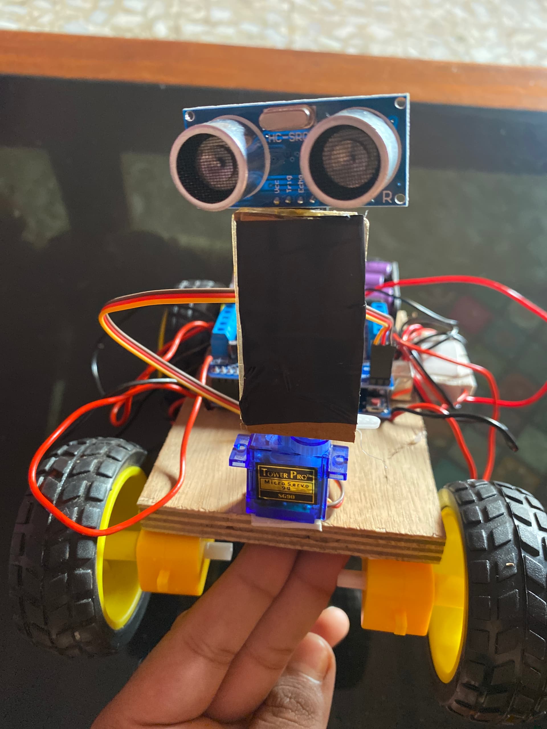 Arduino uno obstacle avoiding car not working - General Guidance - Arduino Forum