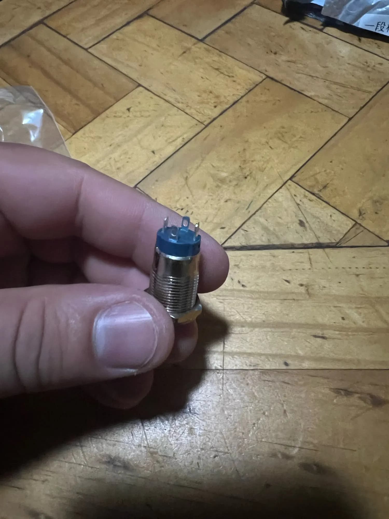 Pushbutton with led: how to check if there is a built-in resistor ...