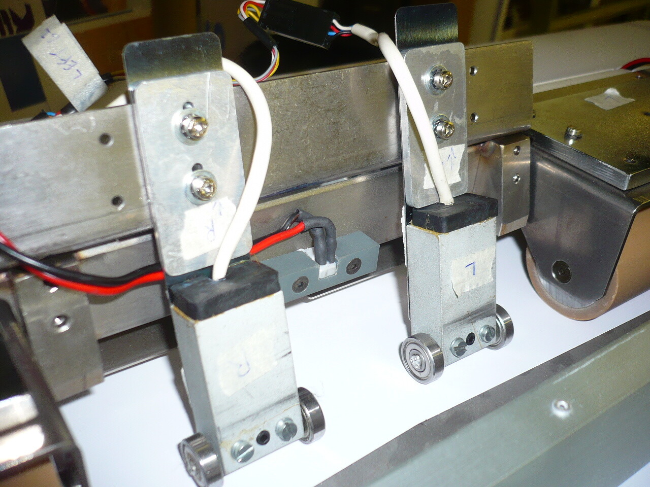 sensor to read the bar and stop the paper advance motor for cutting ...